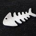 Fish Bone Shaped Aluminum Guitar Pick - Custom Cut and Produced One at ...
