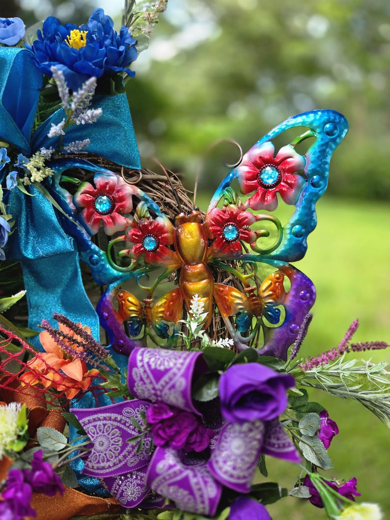 Grapevine Wreath With Metal Butterfly, Ribbons of Blue, Purple, Orange ...