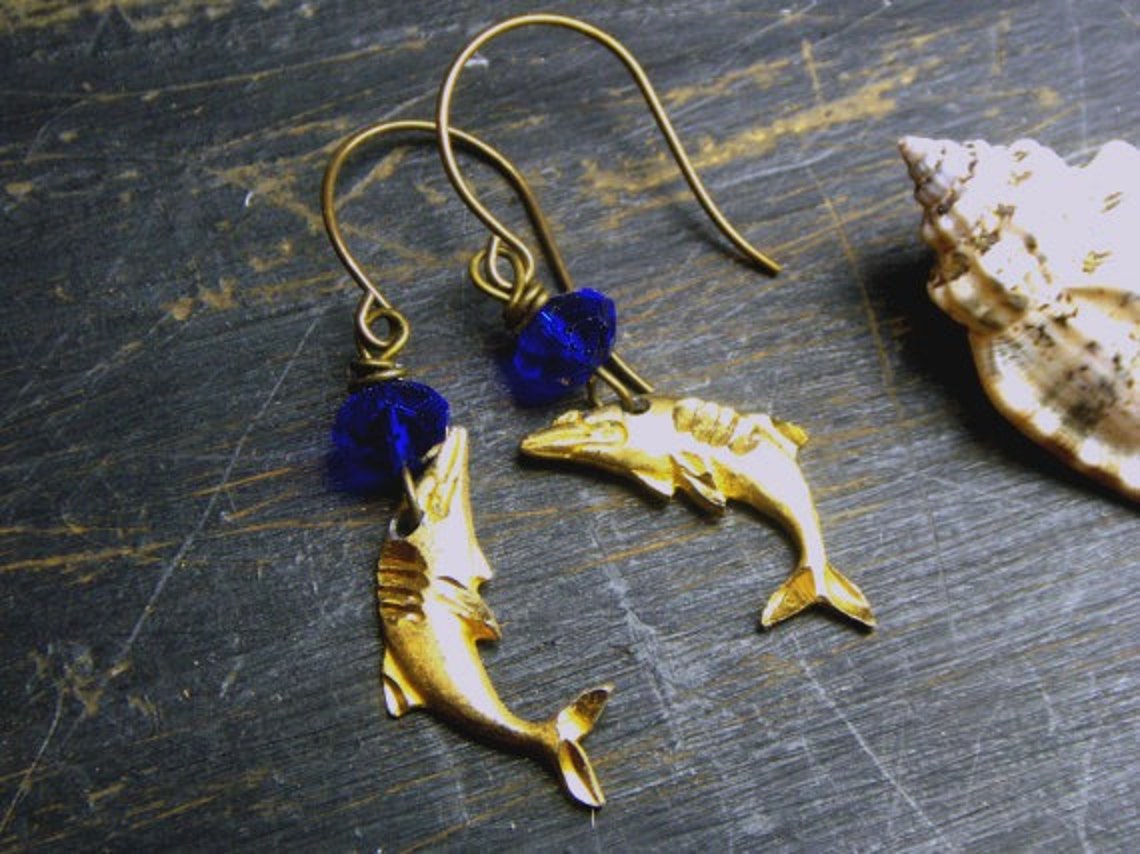 The Delphic Blue Earrings. Brass Dolphins and Royal Blue Czech Glass ...