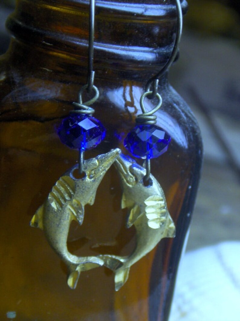 The Delphic Blue Earrings. Brass Dolphins and Royal Blue Czech Glass ...