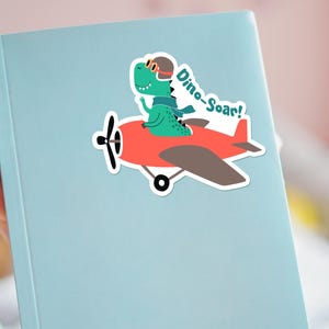 Dino-soar - Cute Dinosaur Sticker, Funny Pun Design, Adorable Vinyl ...
