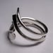 Winged Two Turn Vortex Energy Ring™ in Sterling Silver - Etsy