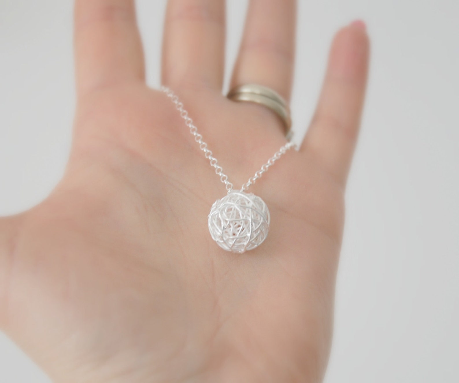 Tangled ball necklace sterling silver wire wrapped yarn ball | Etsy