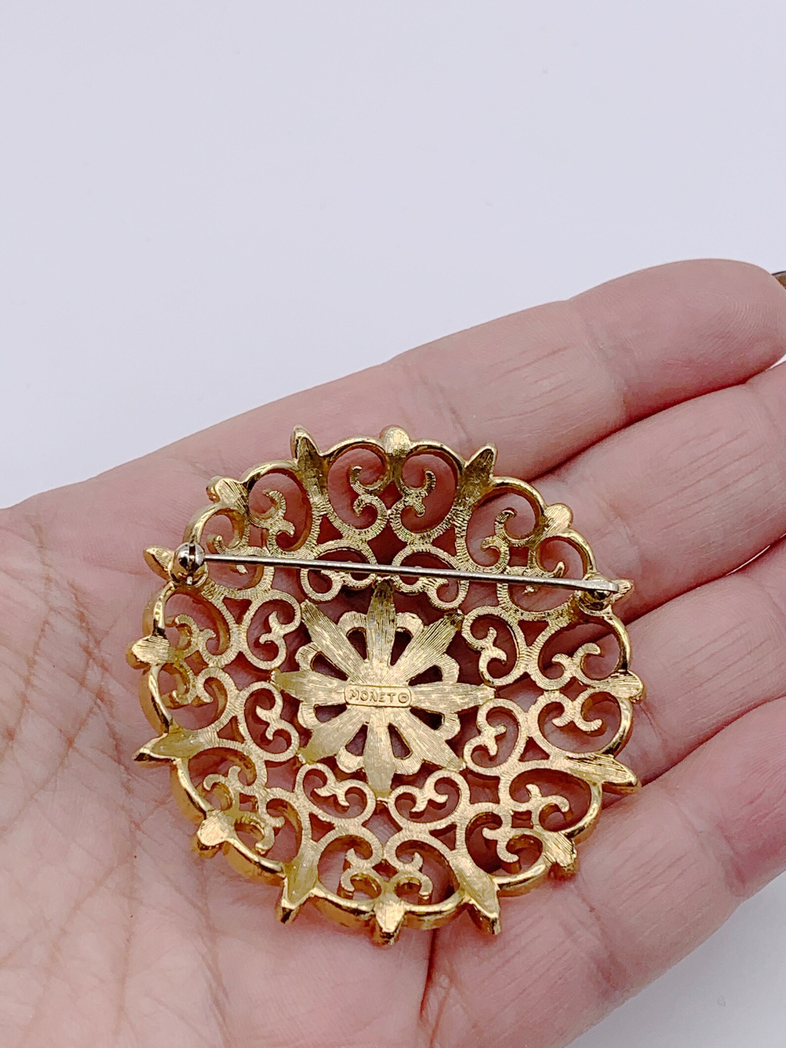 Vintage Monet Floral Medallion Brooch Scroll Open Work Gold Tone Flower ...