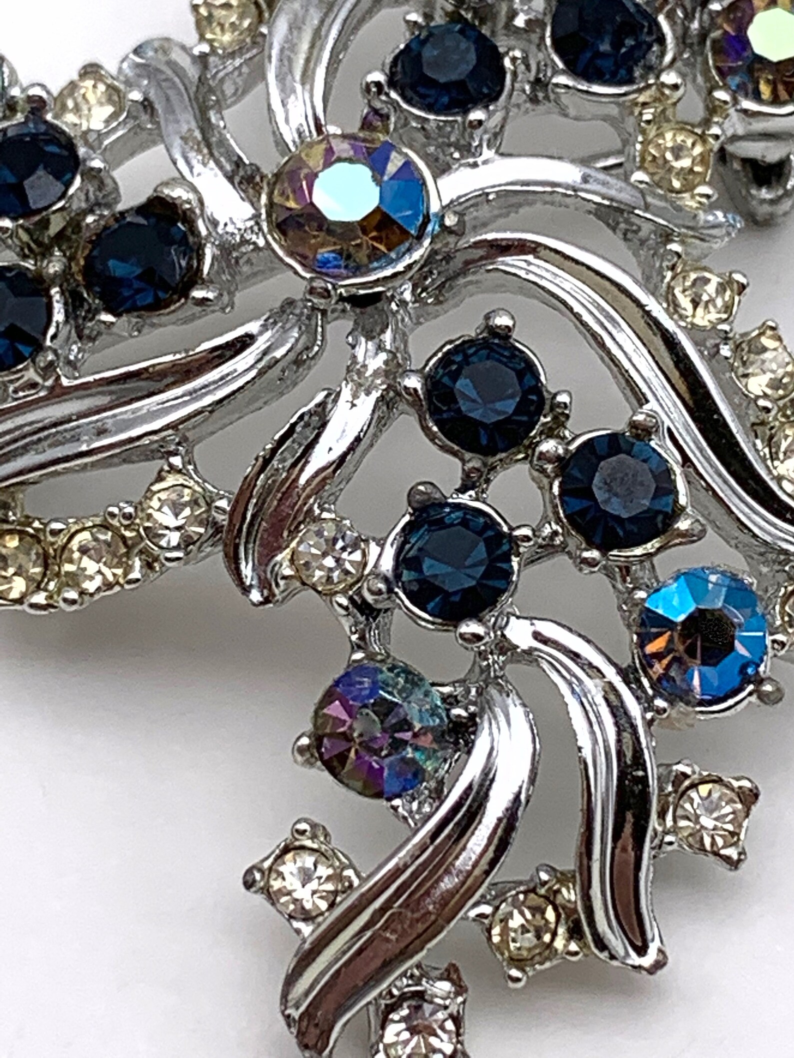 Middle Blue and AB Rhinestones Swirl Design Brooch Accentuated by Clear ...