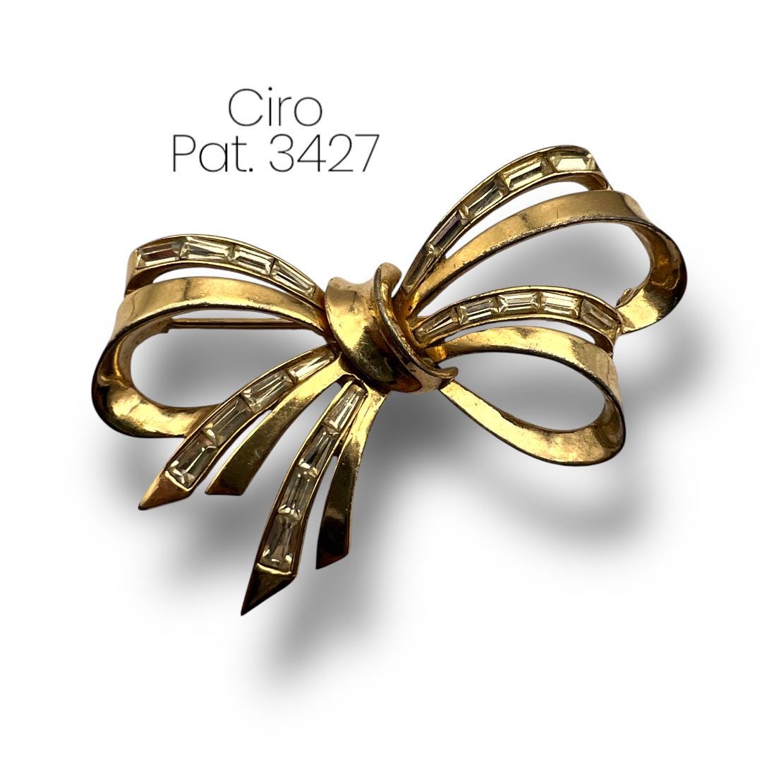 Vintage CIRO Numbered Gold Bow Brooch With Baguette Diamante Accent ...