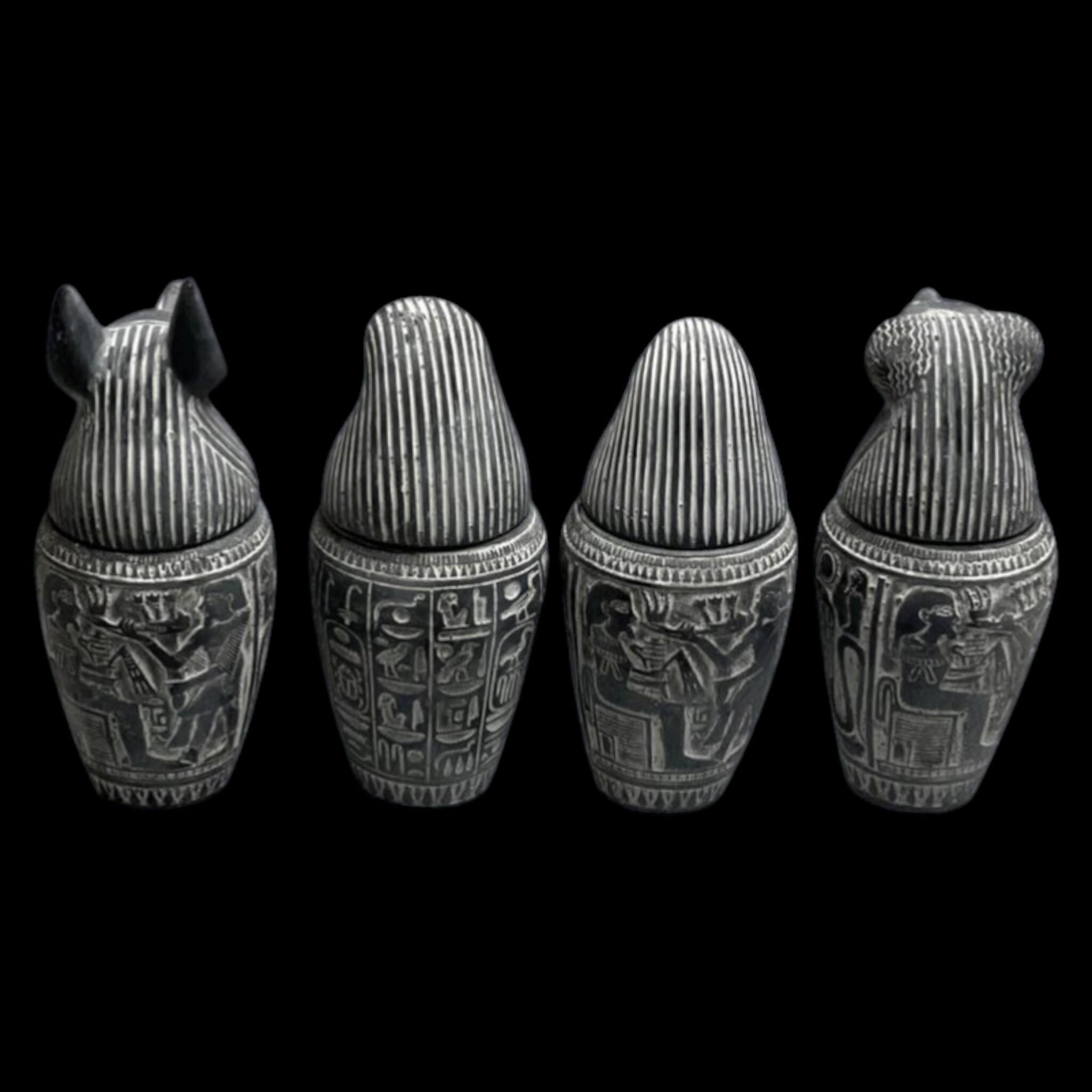 Ancient Egyptian Canopic Jars Set: Sacred Funerary Vessels of ...