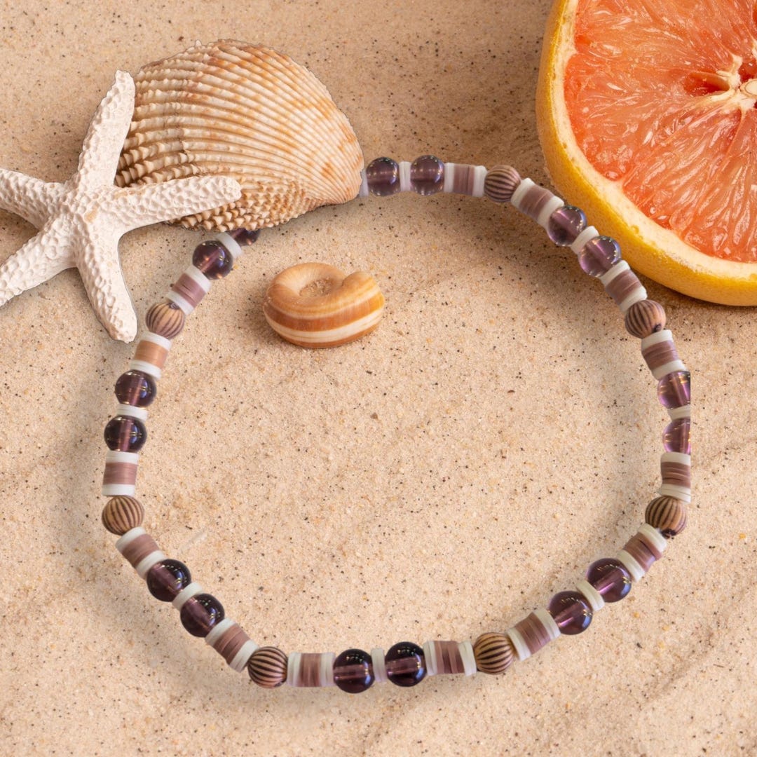 Beaded Necklaces in a Variety of Sizes and Types of Beads: Metal, Glass ...