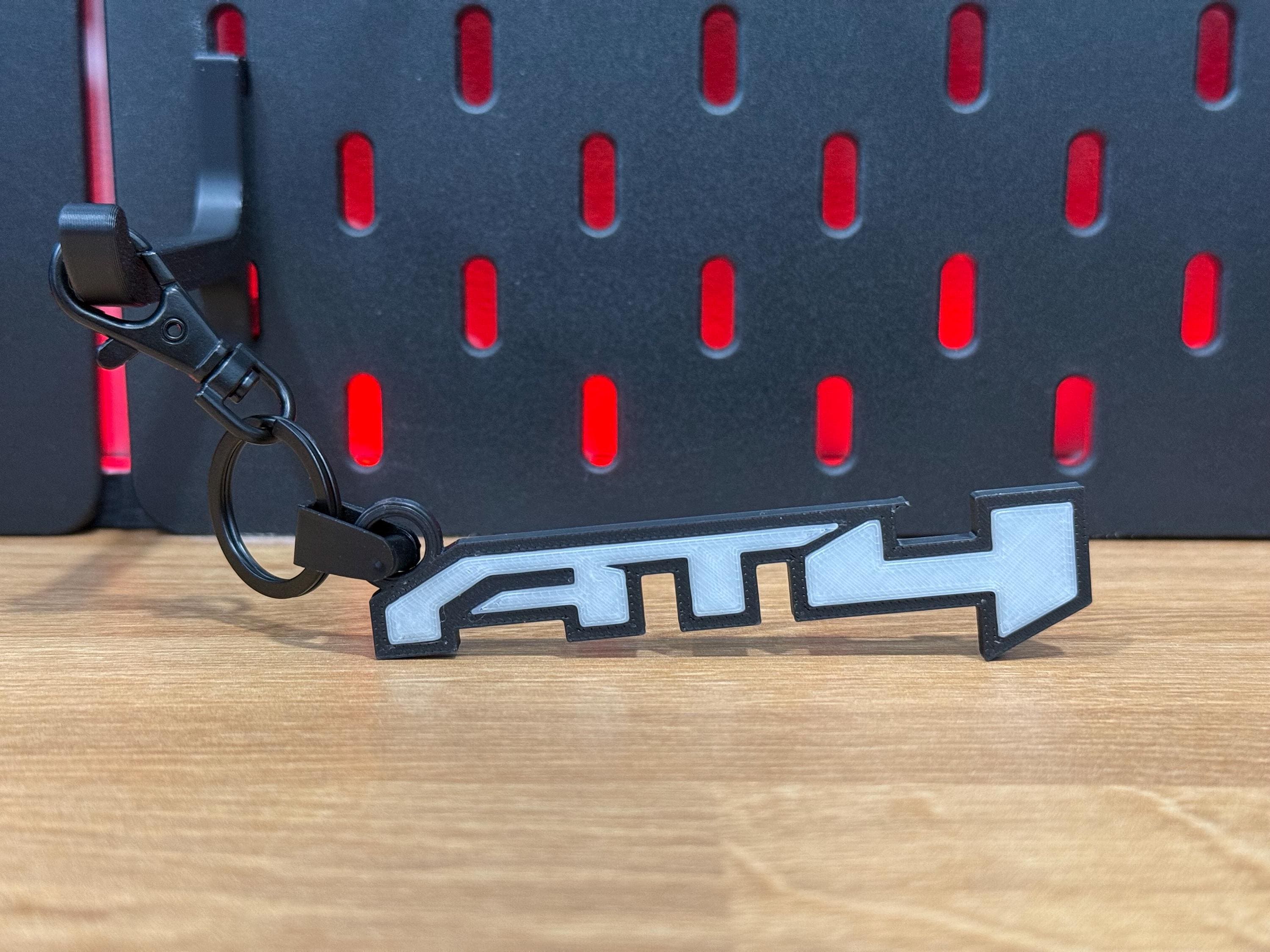 GMC AT4 Logo Keychain (set of 2) – Glow in the Dark Key Chain for Truck ...