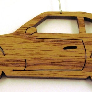 Scroll saw cut wooden race car ornament | Etsy