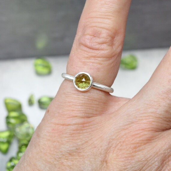 Pale green peridot ring store