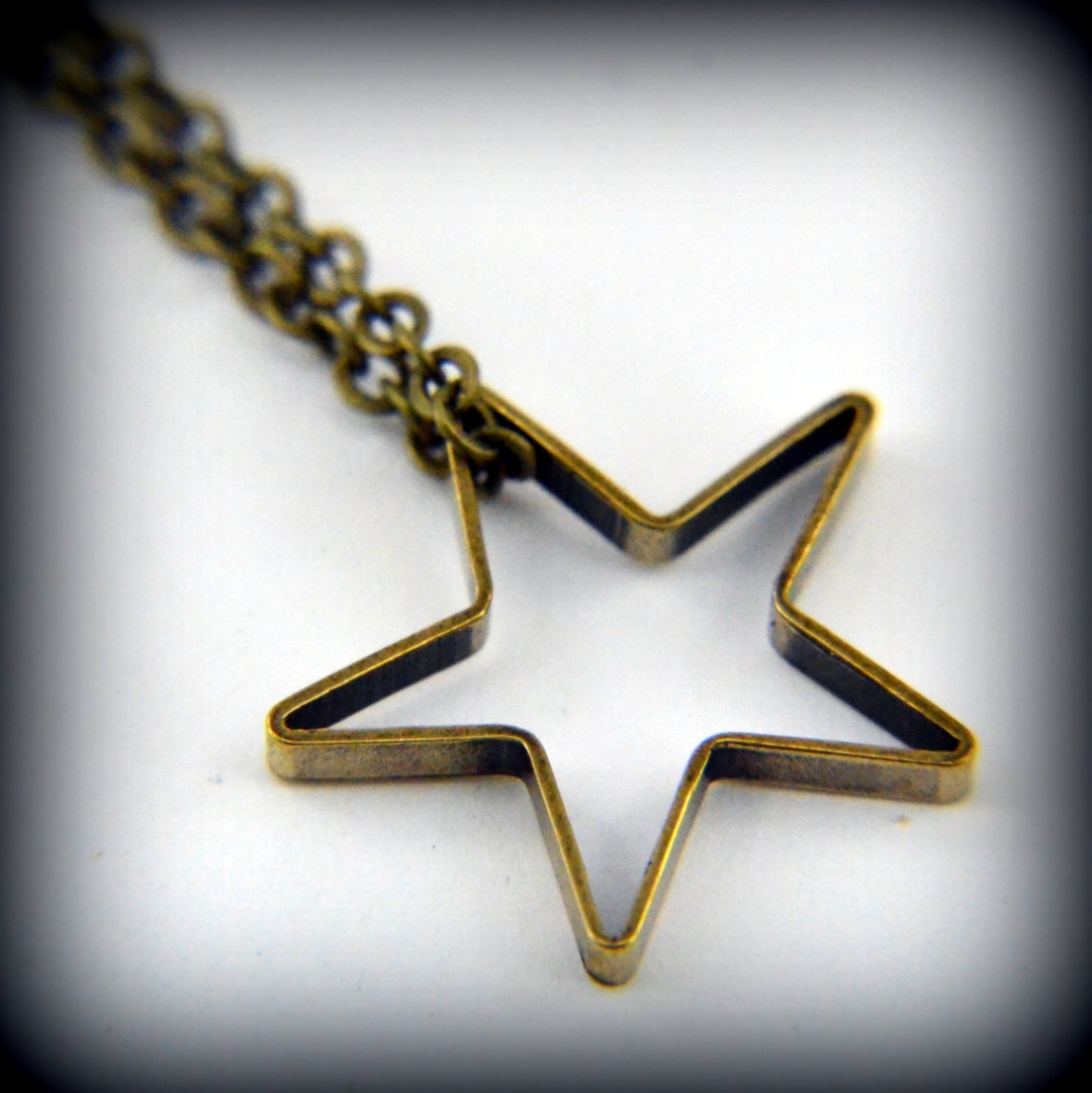 Gold Star Necklace in Bronze - A Symbol of Aspiration Inspiration ...