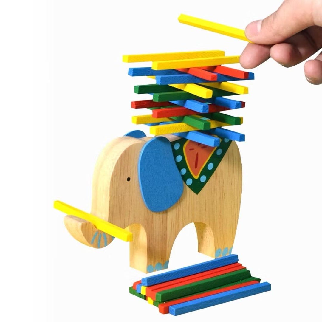 Wooden Toy of an Elephant Carrying a Log | Christmas and Holiday Gift ...