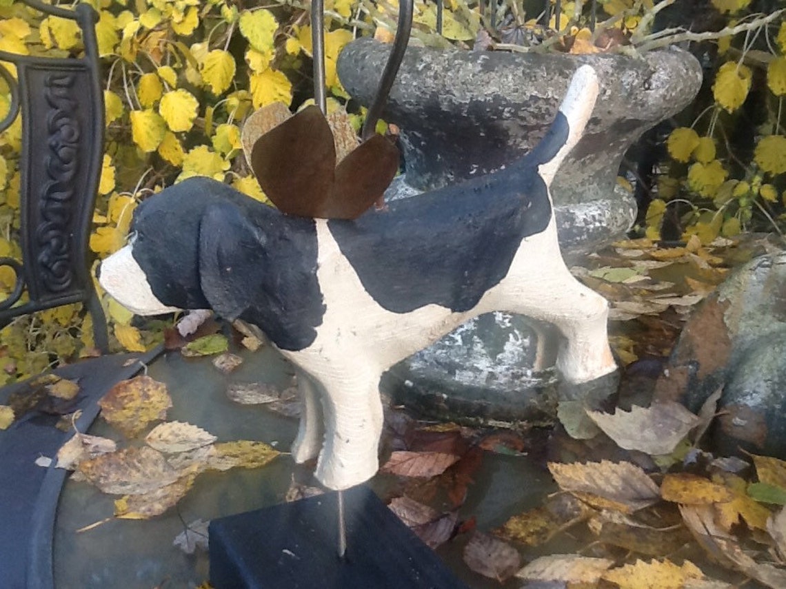 Carved black and white beagle with wings and hook for home | Etsy