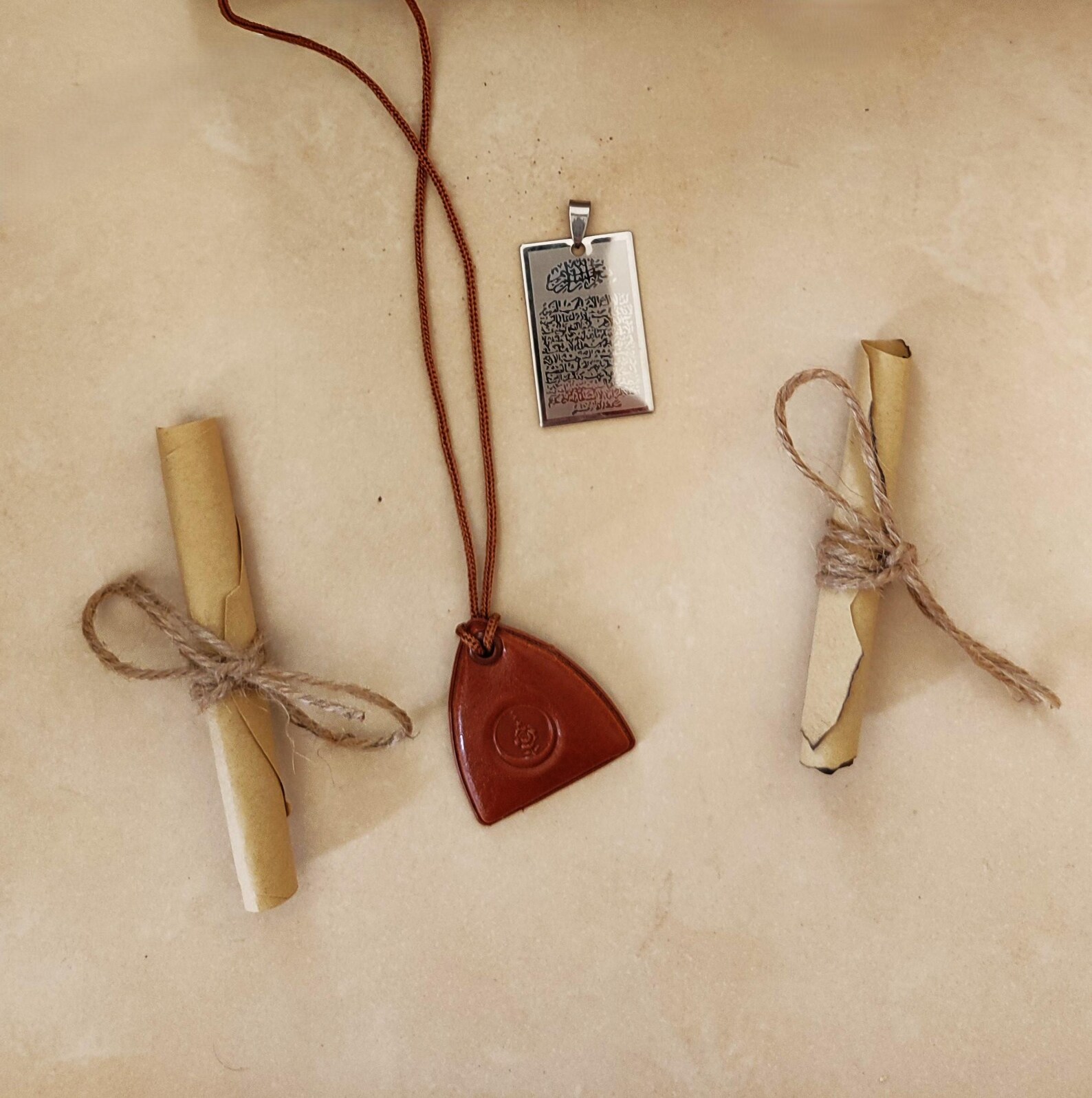 A Box Full of Talismans. Includes a Leather Talisman, a Wooden Talisman ...