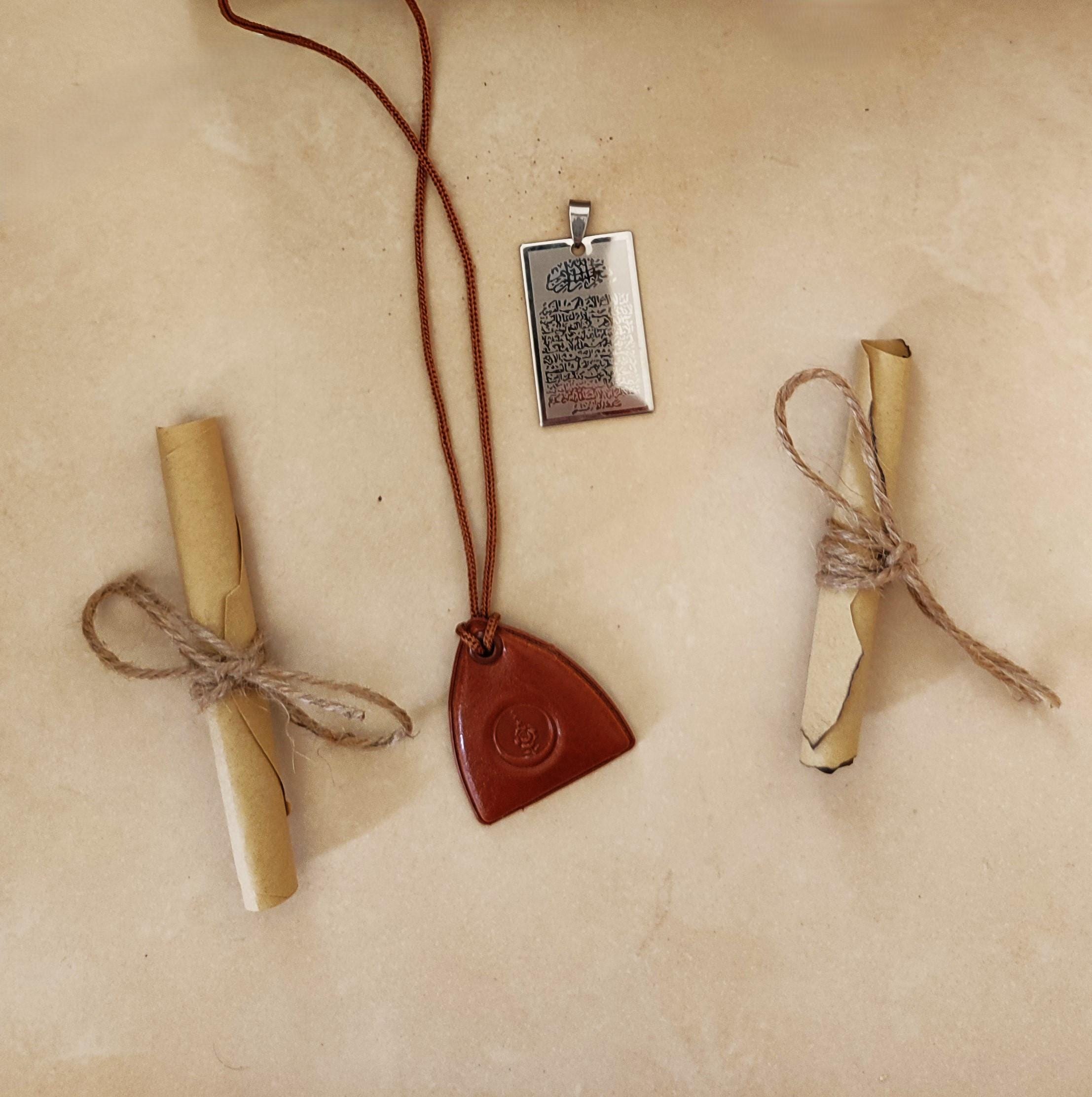 A Box Full of Talismans. Includes a Leather Talisman, a Wooden Talisman ...