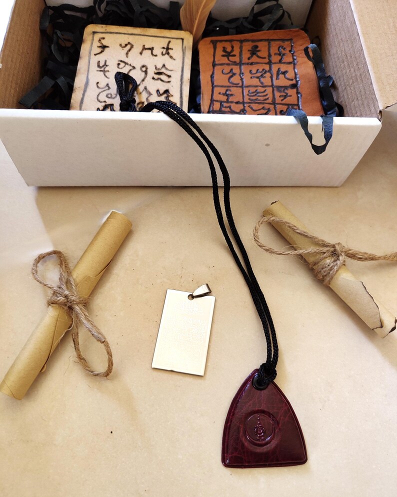 A Box Full of Talismans. Includes a Leather Talisman, a Wooden Talisman ...