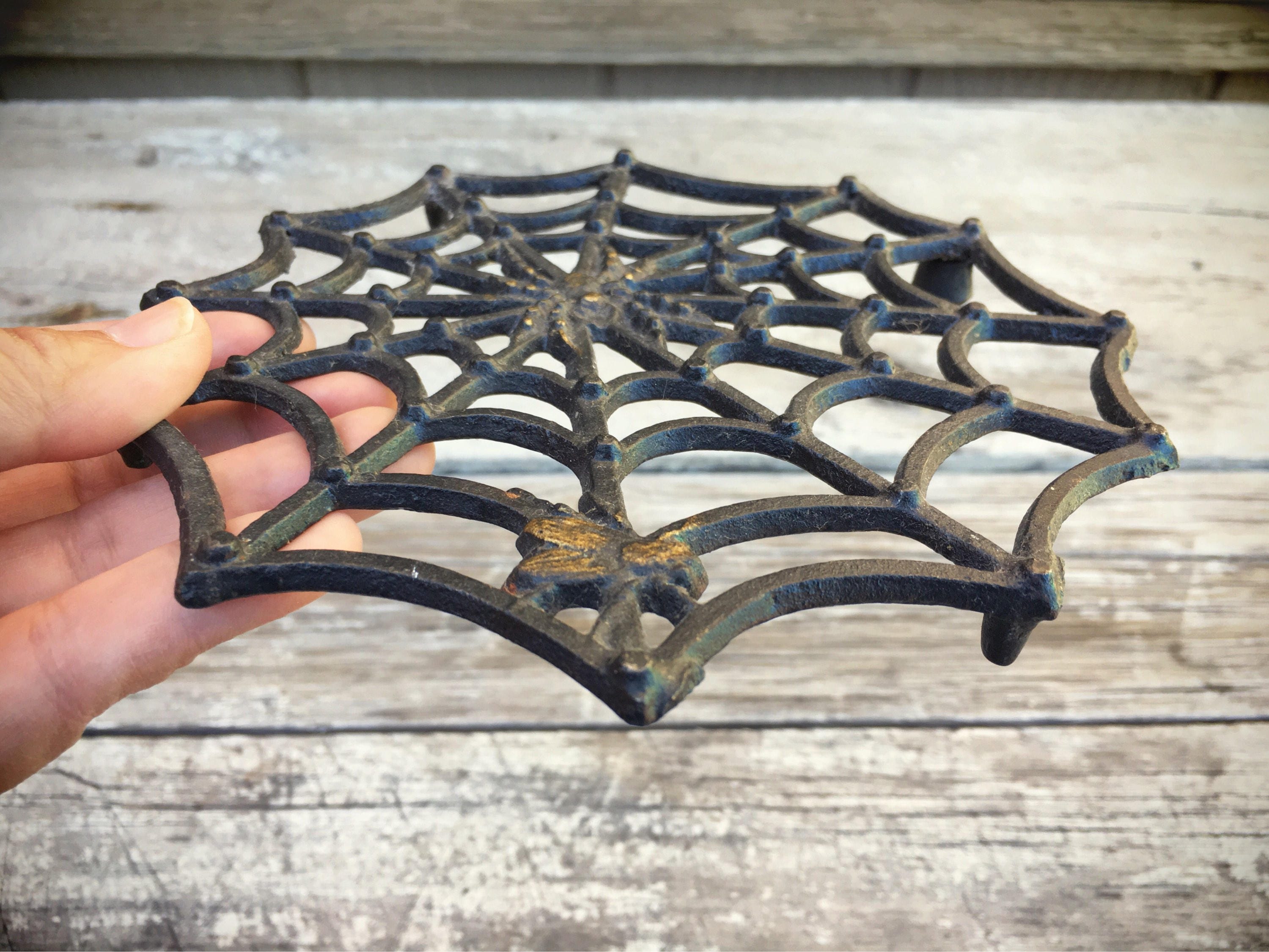 Cast iron spiderweb trivet hot plate spoon rest Halloween decor