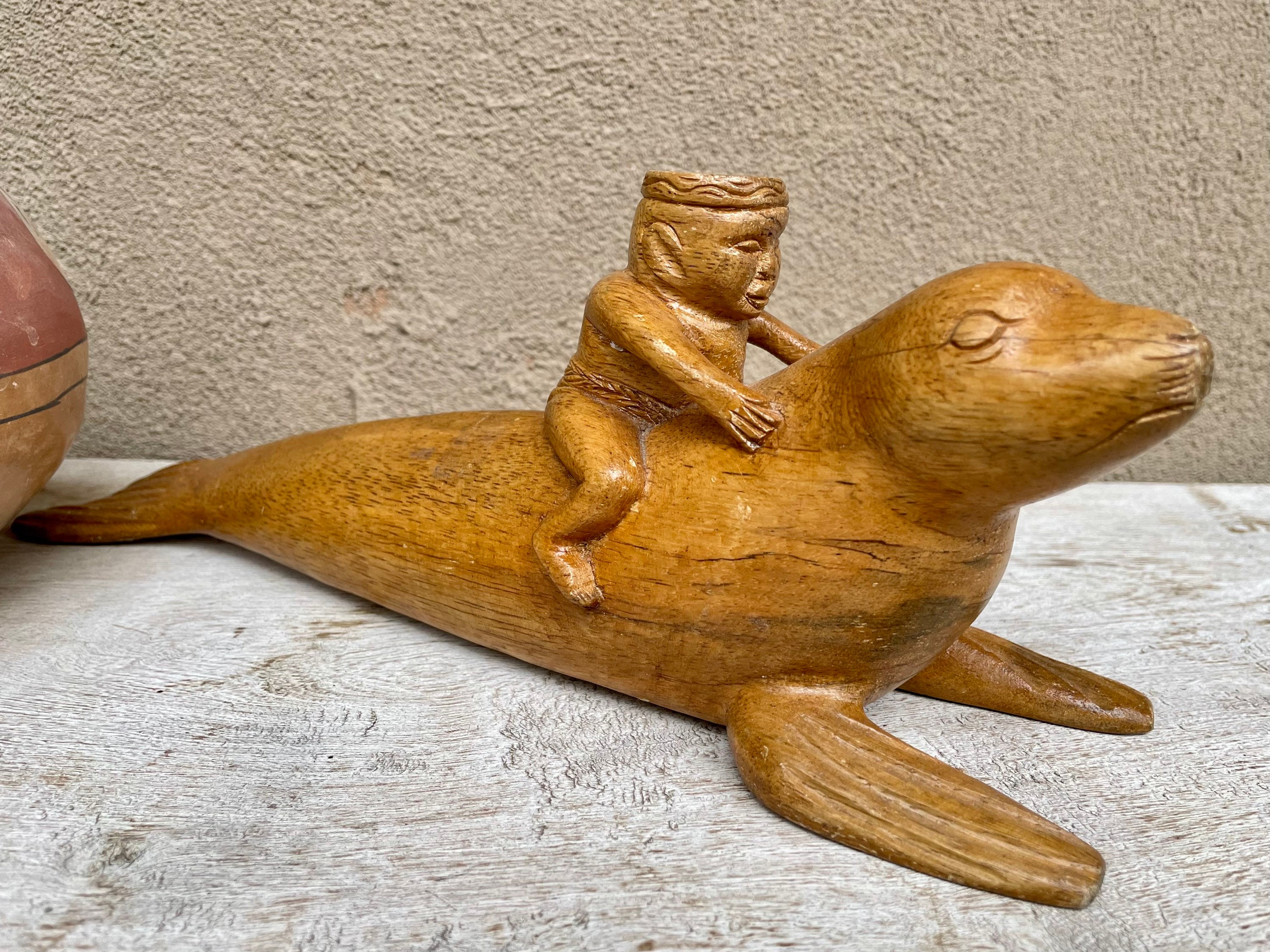 Vintage Southeast Asian Carved Wood Man Riding Sea Lion Seal Sculpture ...
