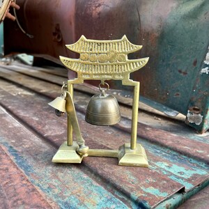Vintage Brass Bell Shaped Like Temple Gong on Archway With Ringer ...