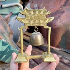 Vintage Brass Bell Shaped Like Temple Gong on Archway With Ringer ...