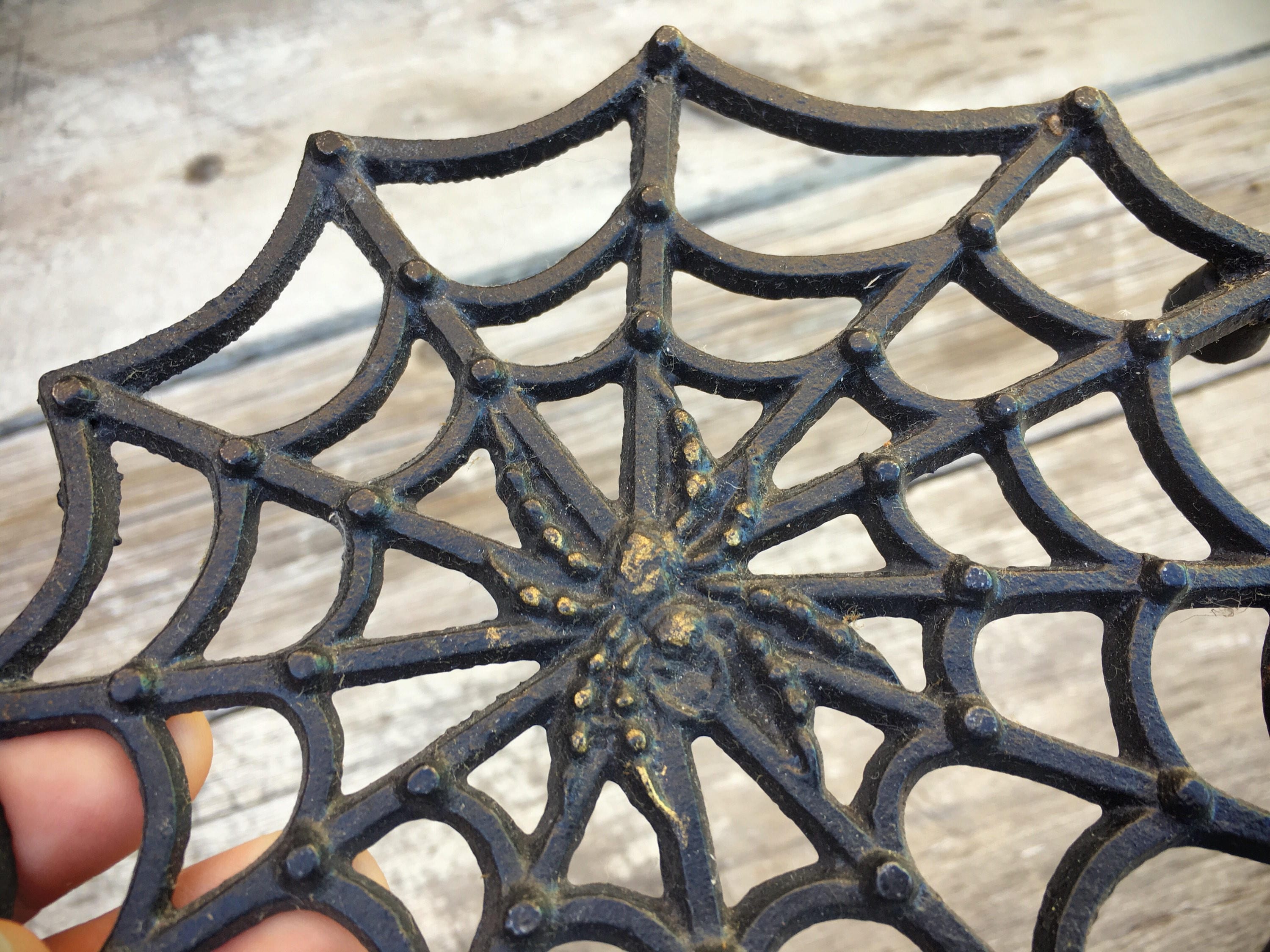 Cast iron spiderweb trivet hot plate spoon rest Halloween decor