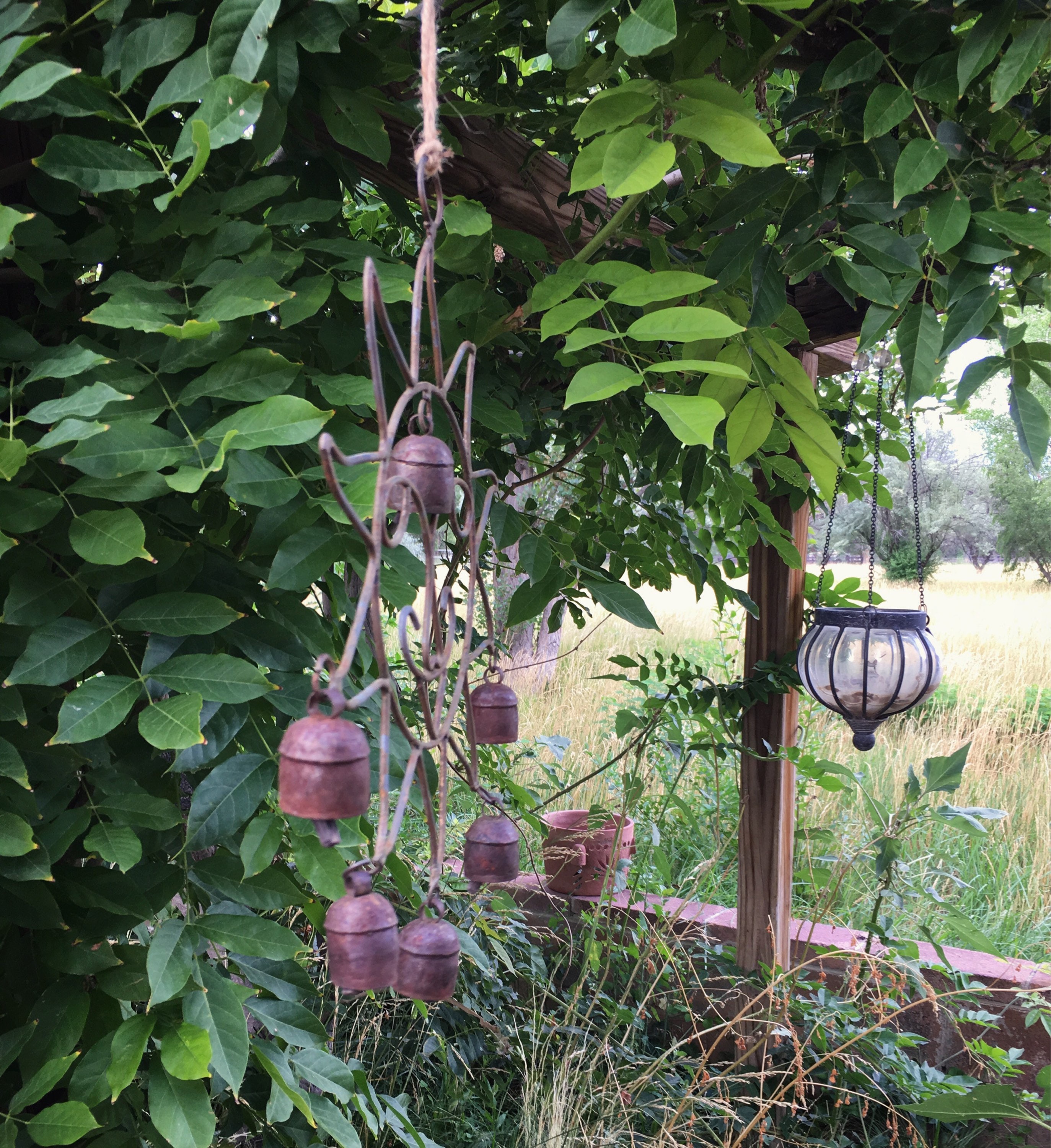 Vintage smiling sun wind chime rusty metal cow bells metal windchimes ...