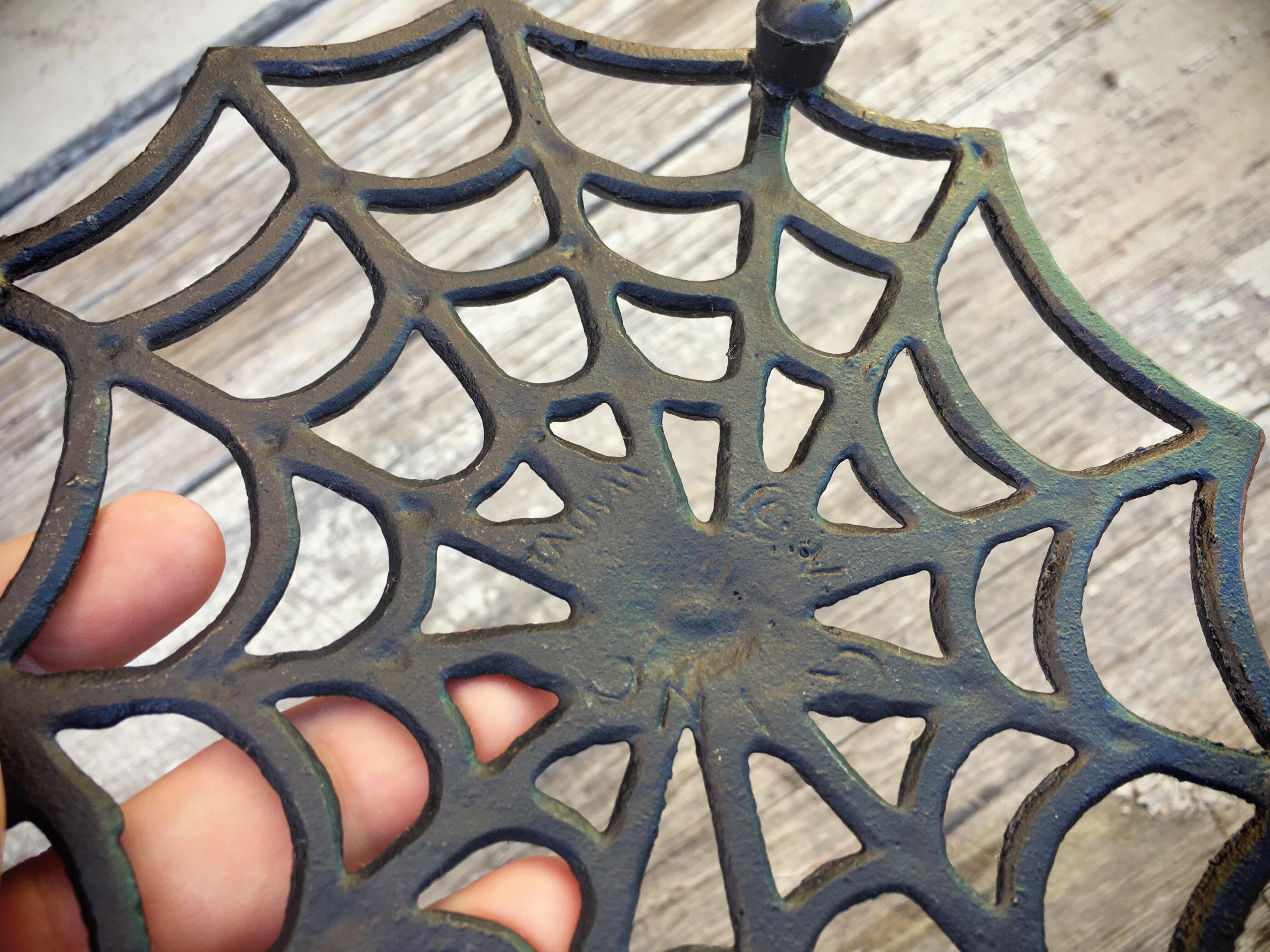 Cast iron spiderweb trivet hot plate spoon rest Halloween decor