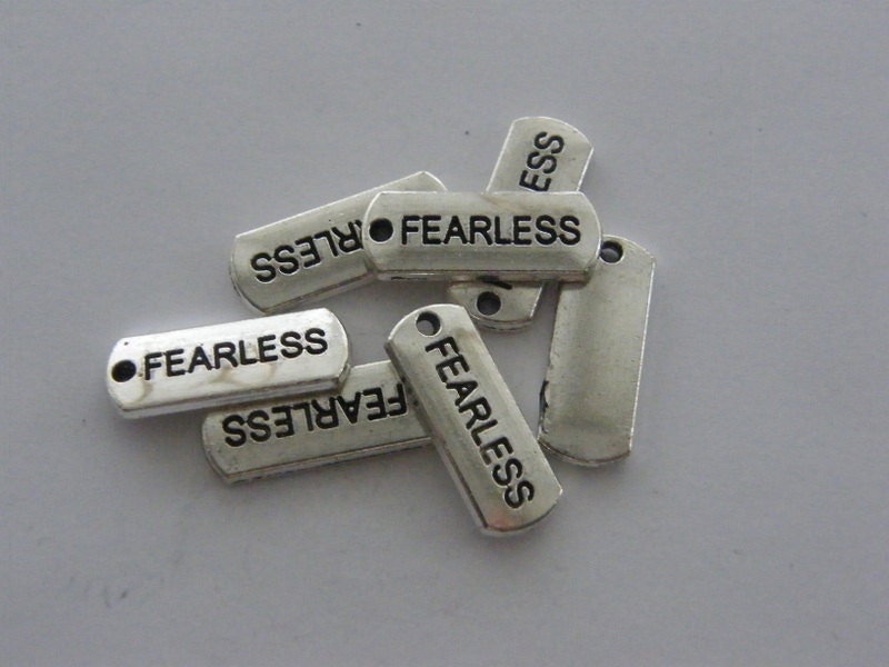 10 Fearless charms antique silver tone M51 | Etsy