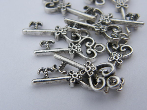 12 Key charms antique silver tone K24 | Etsy