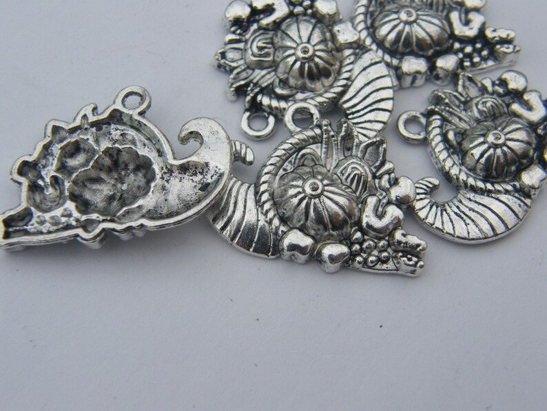 4 Cornucopia Pendants Tibetan Silver FD335 - Etsy