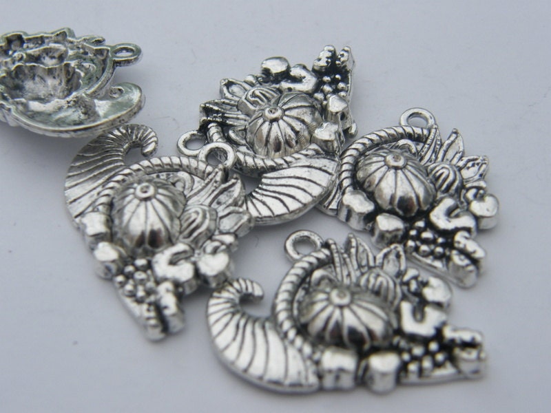 4 Cornucopia Pendants Tibetan Silver FD335 - Etsy
