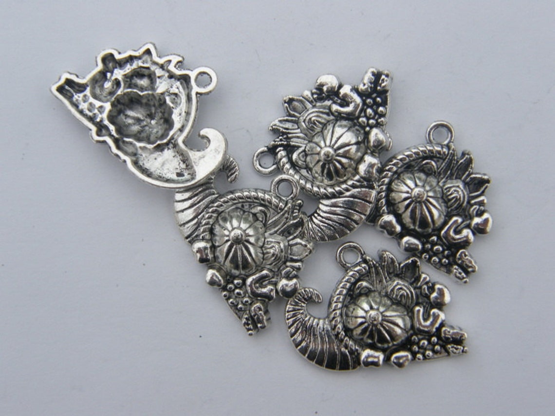 4 Cornucopia Pendants Tibetan Silver FD335 - Etsy