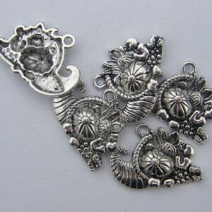 4 Cornucopia Pendants Tibetan Silver FD335 - Etsy