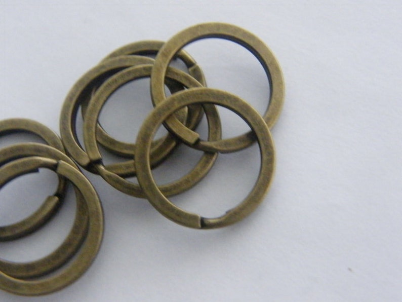 12 Key rings 20 x 2mm bronze tone FS376 | Etsy