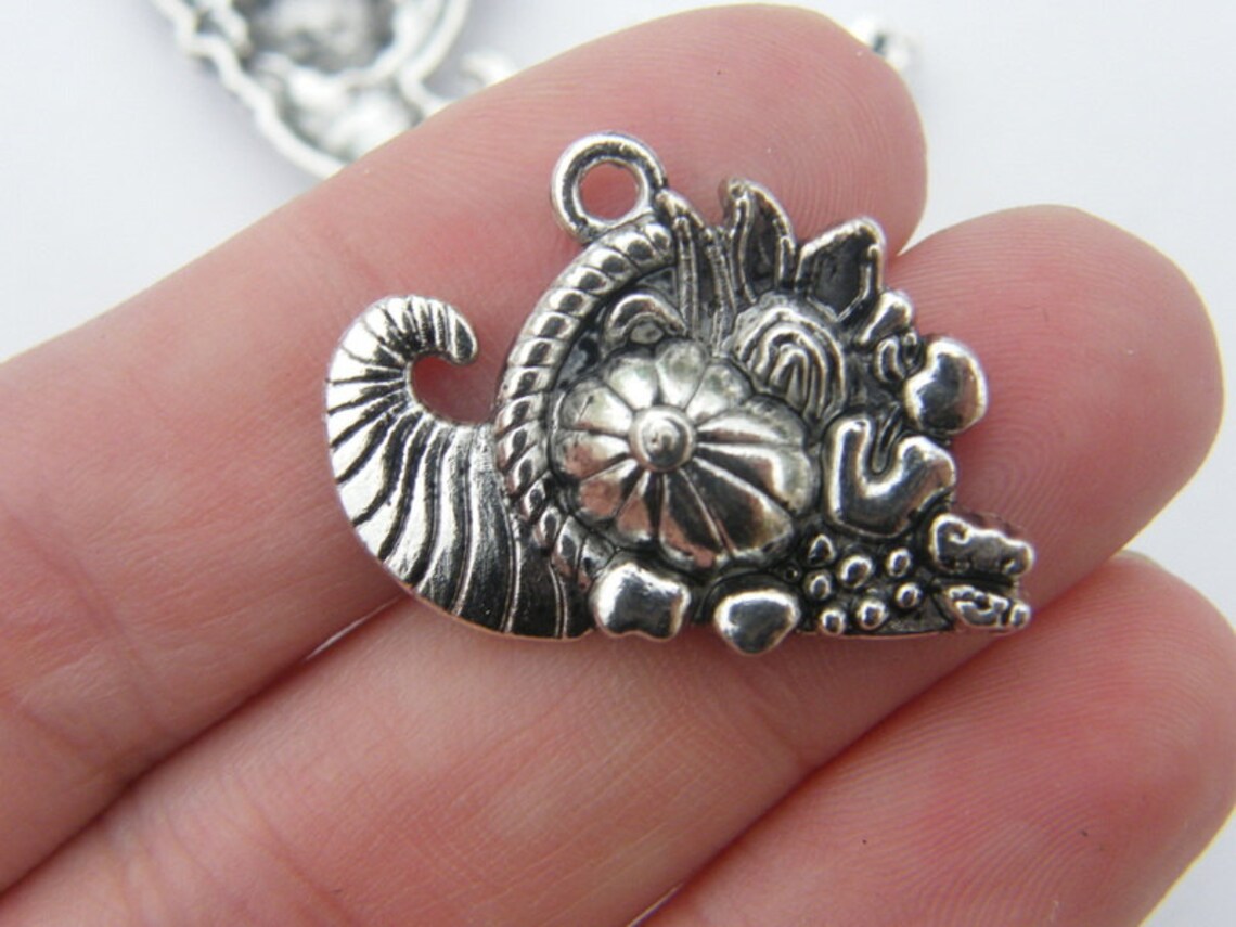 4 Cornucopia Pendants Tibetan Silver FD335 - Etsy