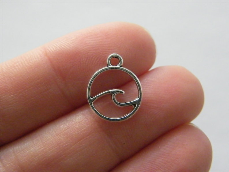 24 charms de onda en tono plata antigua FF234 - Etsy España