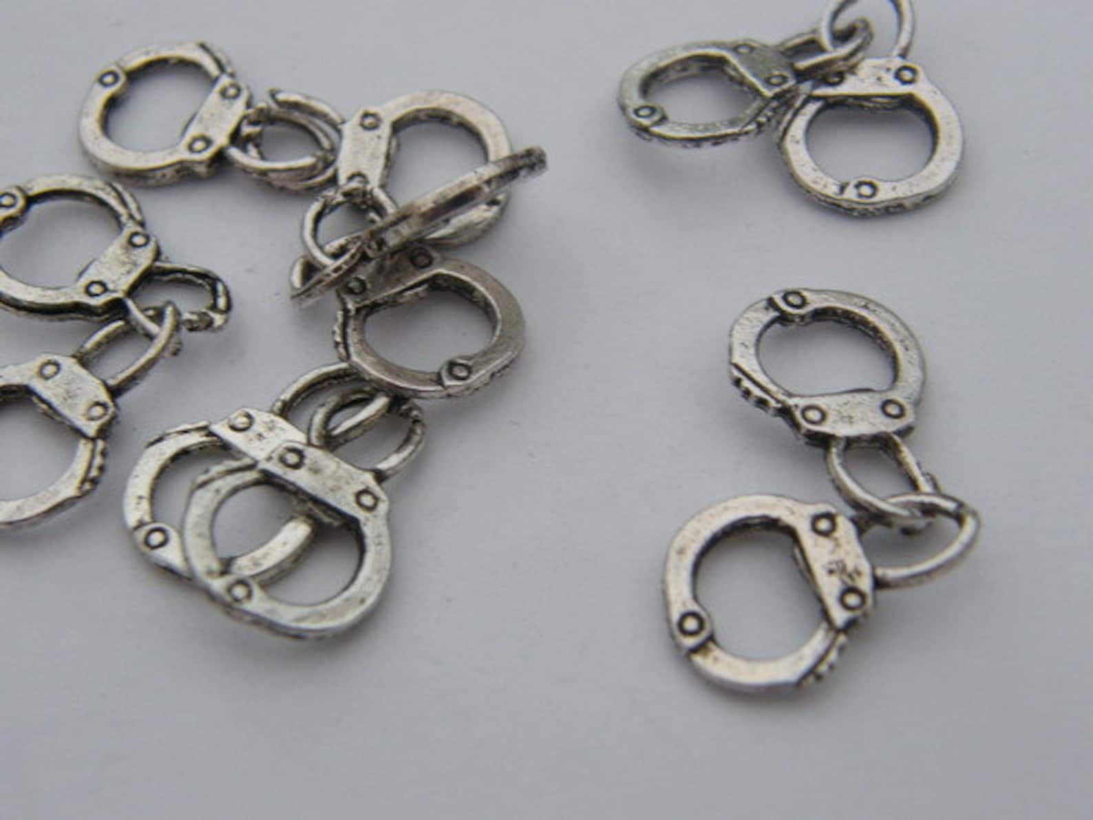 6 Pair of Handcuff Charms Antique Silver Tone G24 - Etsy UK
