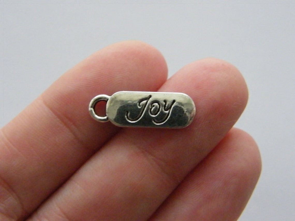 BULK 50 Joy charms antique silver tone M104 | Etsy