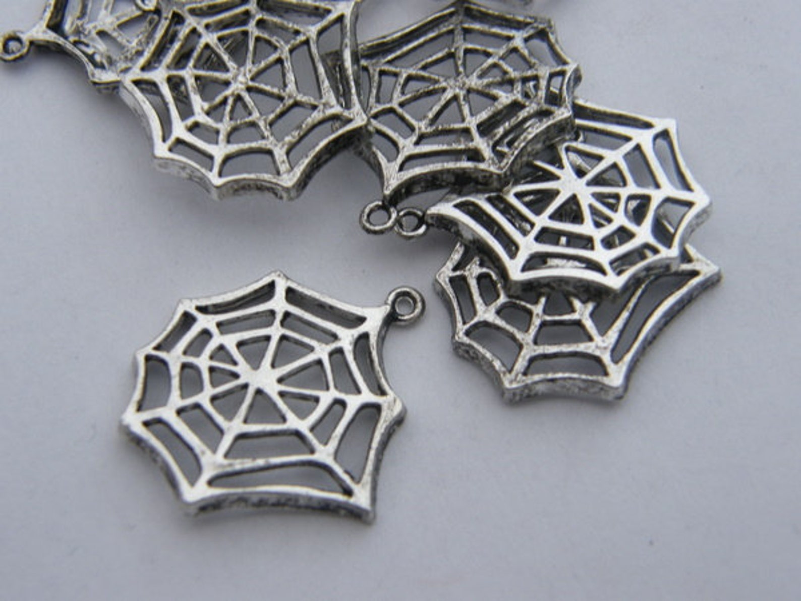 6 Cobweb or Spiderweb Charms Tibetan Silver HC132 - Etsy
