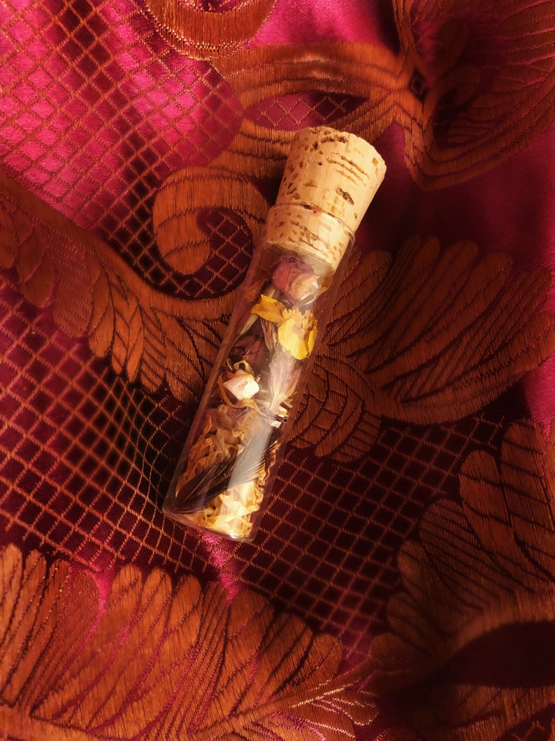 Witches Vial - Snake Vertebrae Marigolds and Feathers - Nature Flora ...