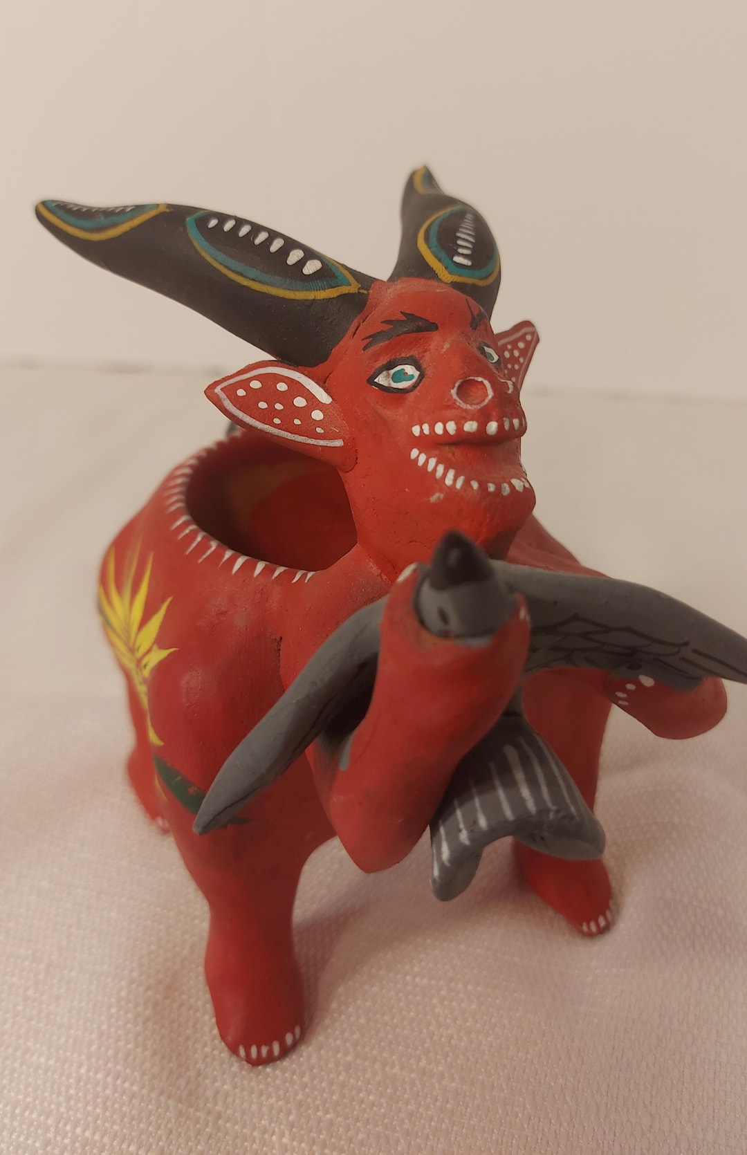 Amazing Handcrafted Clay Sculpture of A Devil Figure Gripping A Bird ...