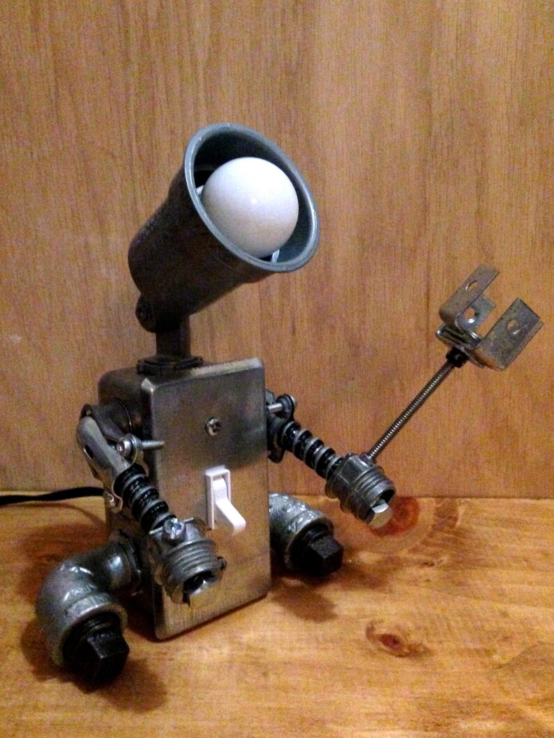 Lámpara Robot con flor de metal - Etsy España