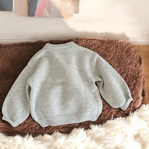 Adorable Girl's Grey/beige Jumper With Bows - Cozy and Stylish Knit ...