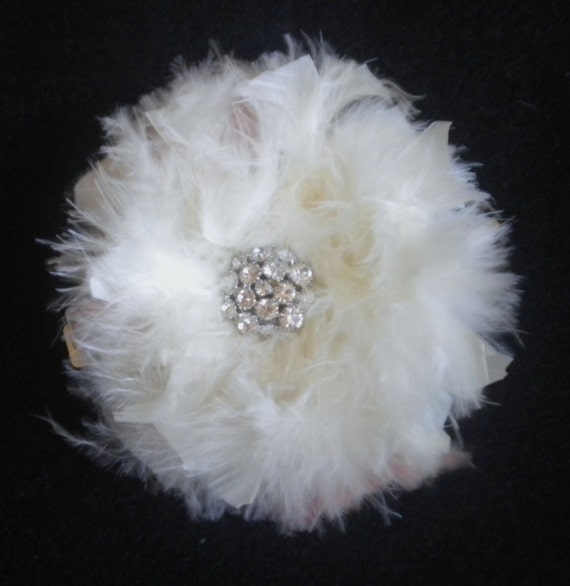 Items similar to Ivory feather flower with rhinestones on Etsy