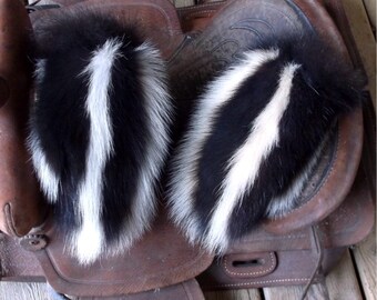 CalfDr. Fur and fleece mittens and suede handbags by CalfDr