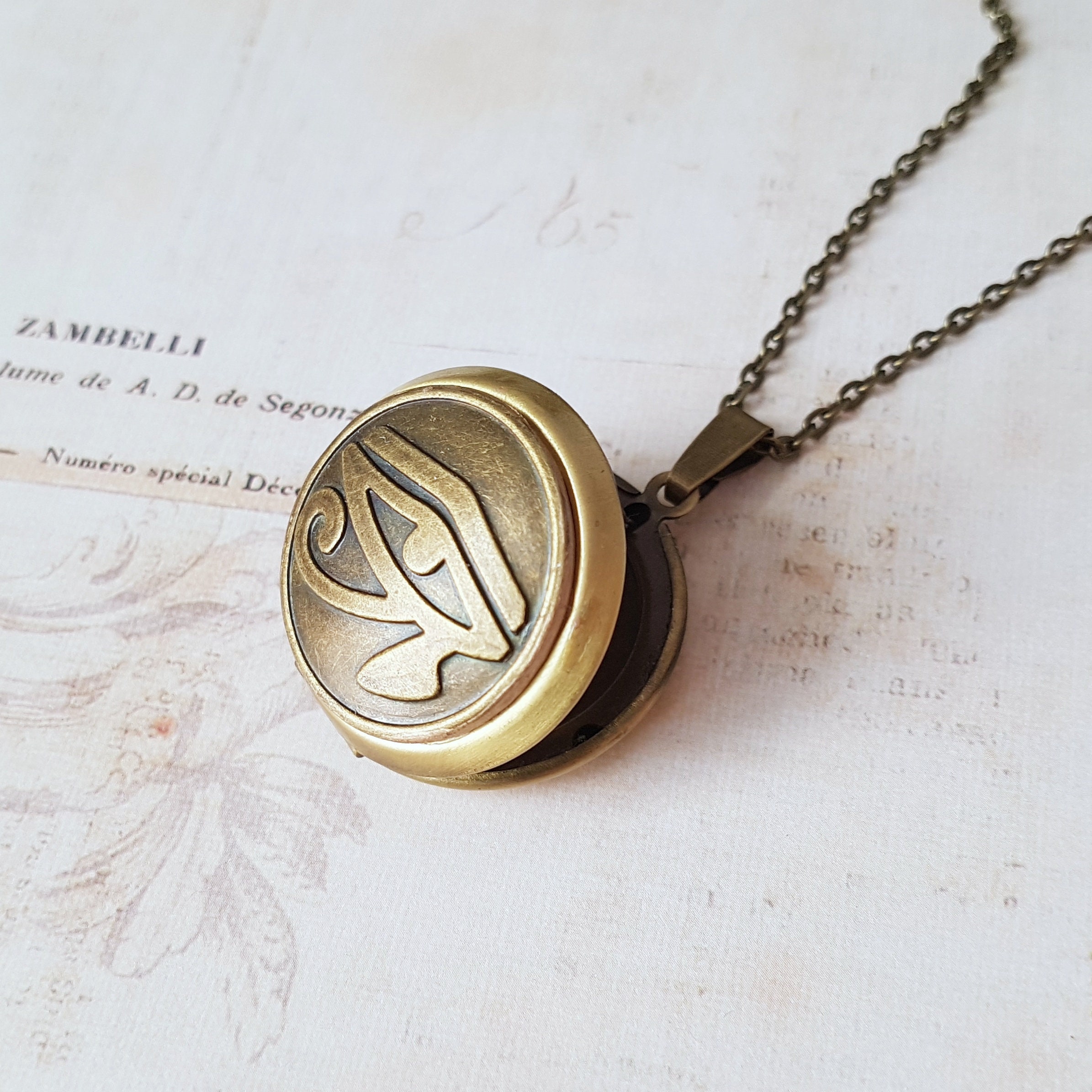 Eye of Ra Eye of Horus Locket Ancient Egyptian Sun Moon | Etsy