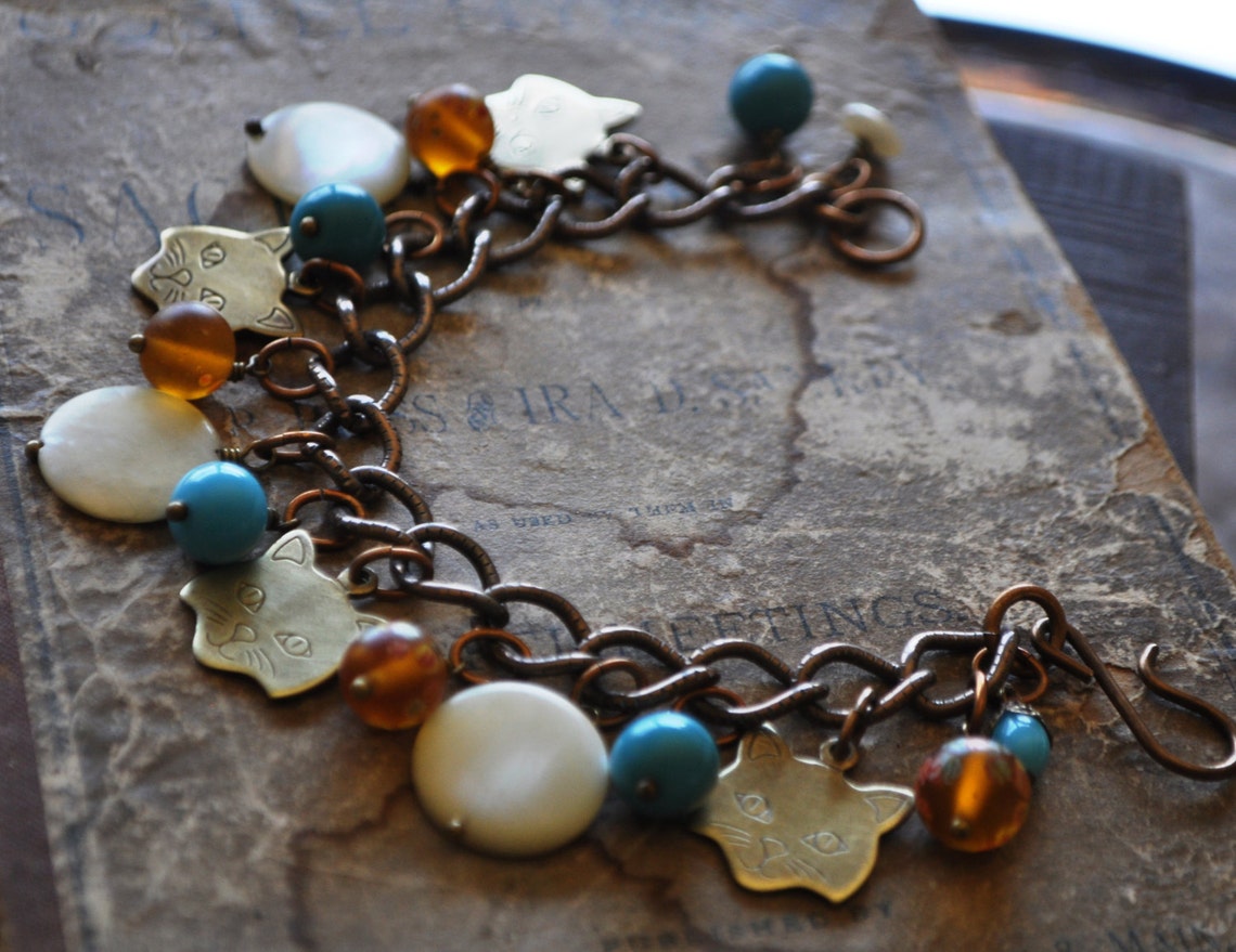 Vintage Cat's Meow Charm Bracelet in Blue and Butterscotch Vintage ...
