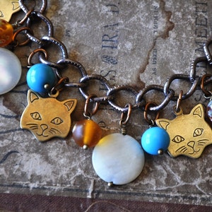 Vintage Cat's Meow Charm Bracelet in Blue and Butterscotch Vintage ...