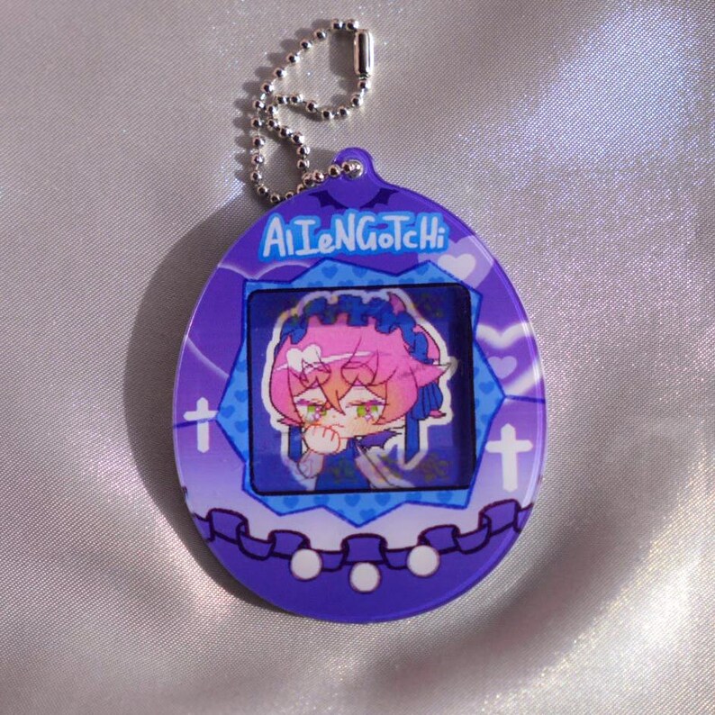 Lenticular Alien Stage Tamagotchi Charm | ALNST Tamagotchi Keychain ...